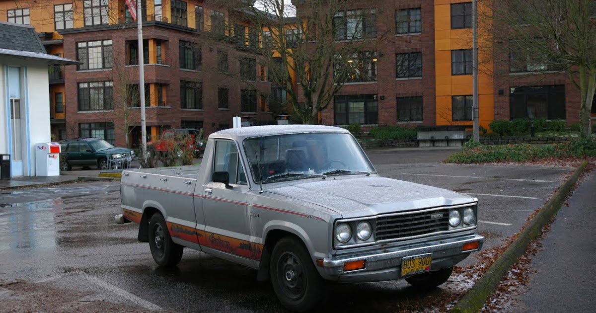 OLD PARKED CARS.: 1980 Mazda Sundowner Sport.