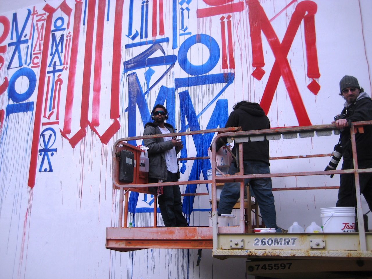 EV Grieve: Retna at work on the Houston/Bowery Mural Wall