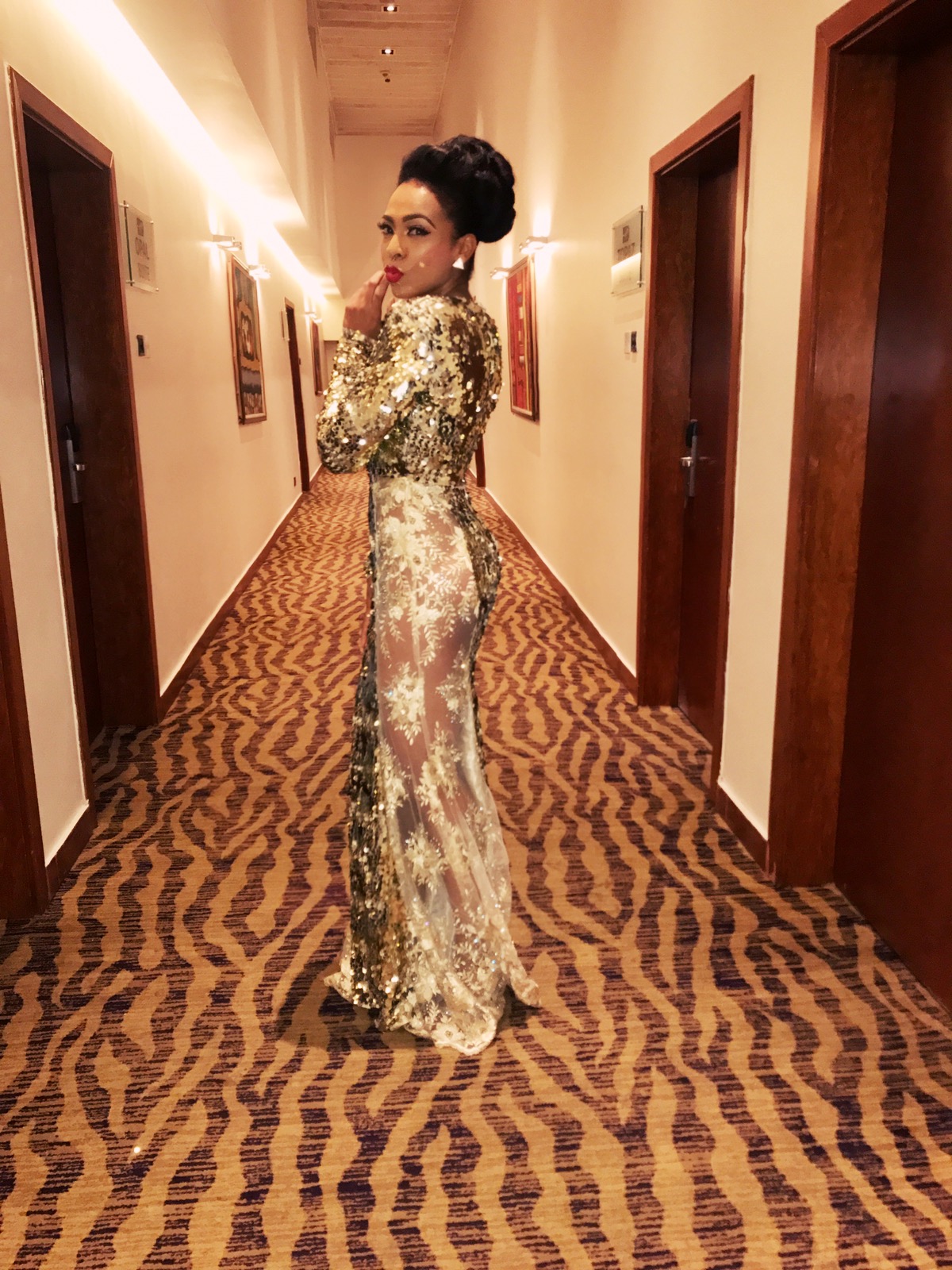 Checkout Tboss' stunning outfit to Afrima