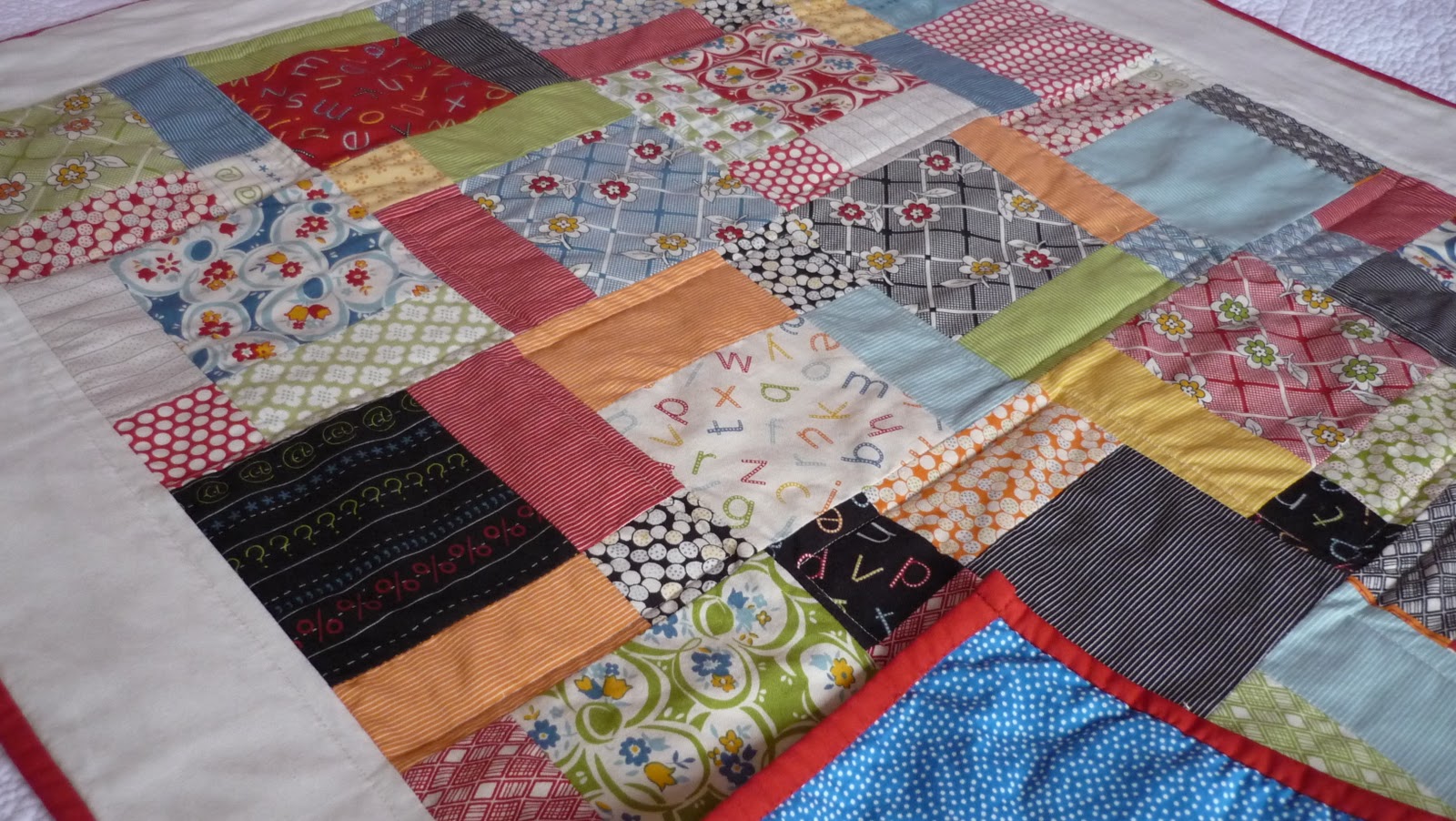 Mown: Disappearing Nine Patch Baby Quilt