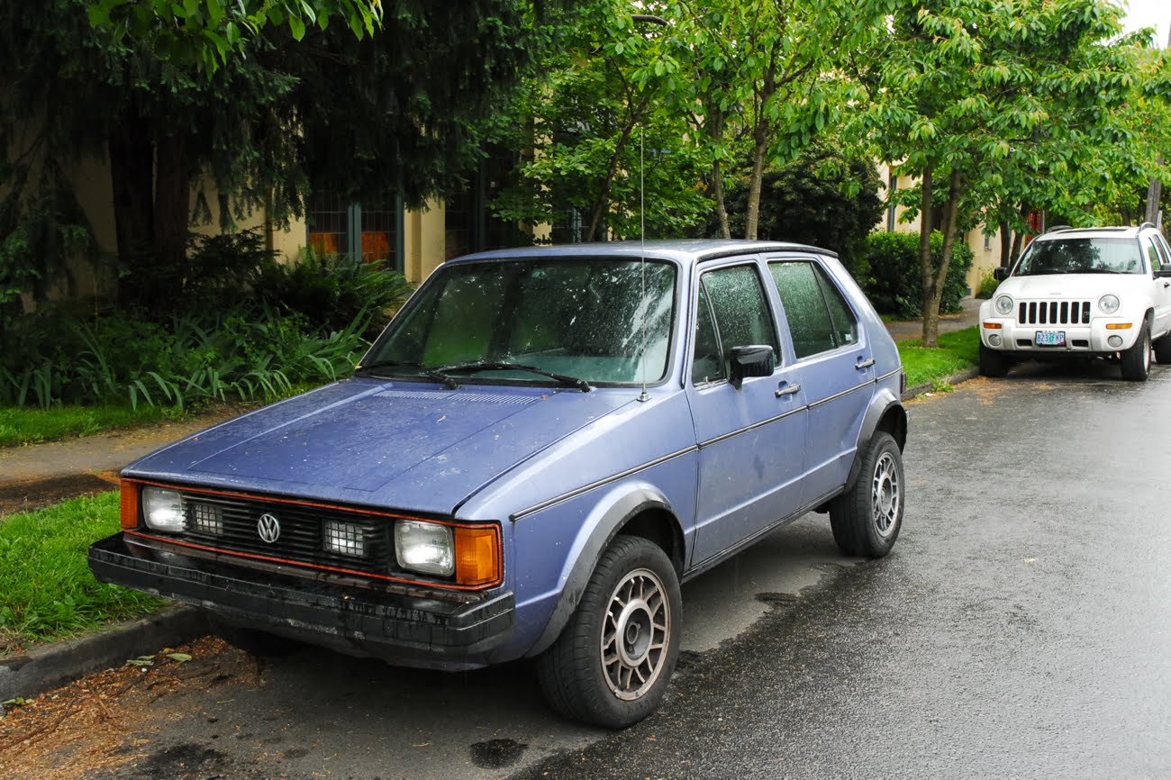 OLD PARKED CARS.: 1983 Volkswagen Rabbit.
