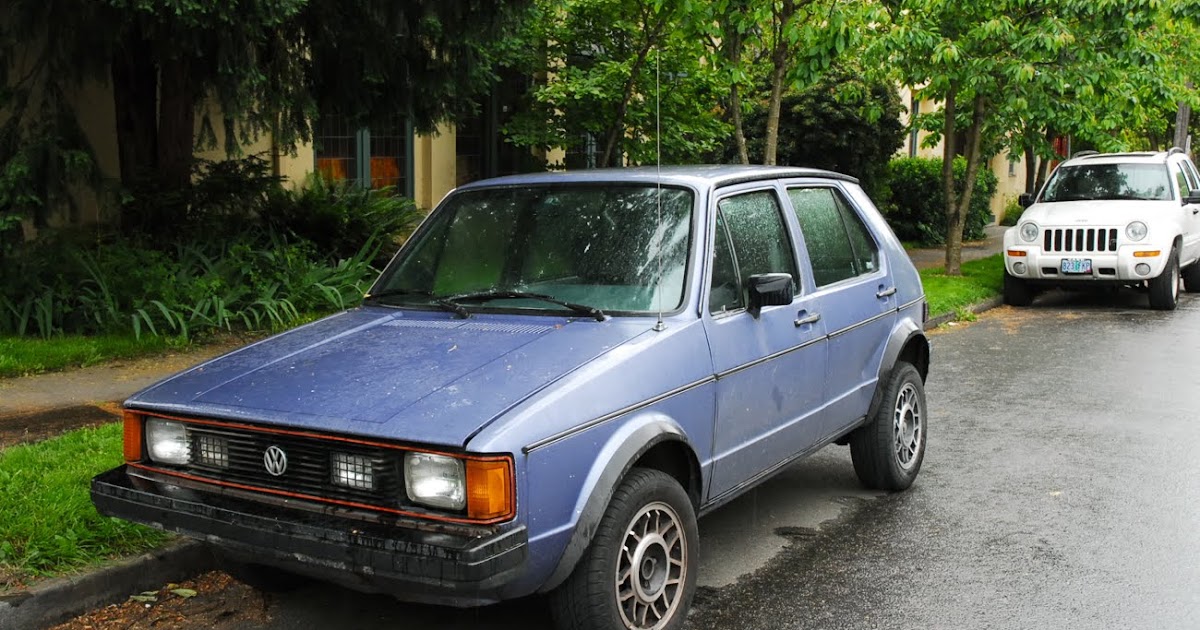 OLD PARKED CARS.: 1983 Volkswagen Rabbit.