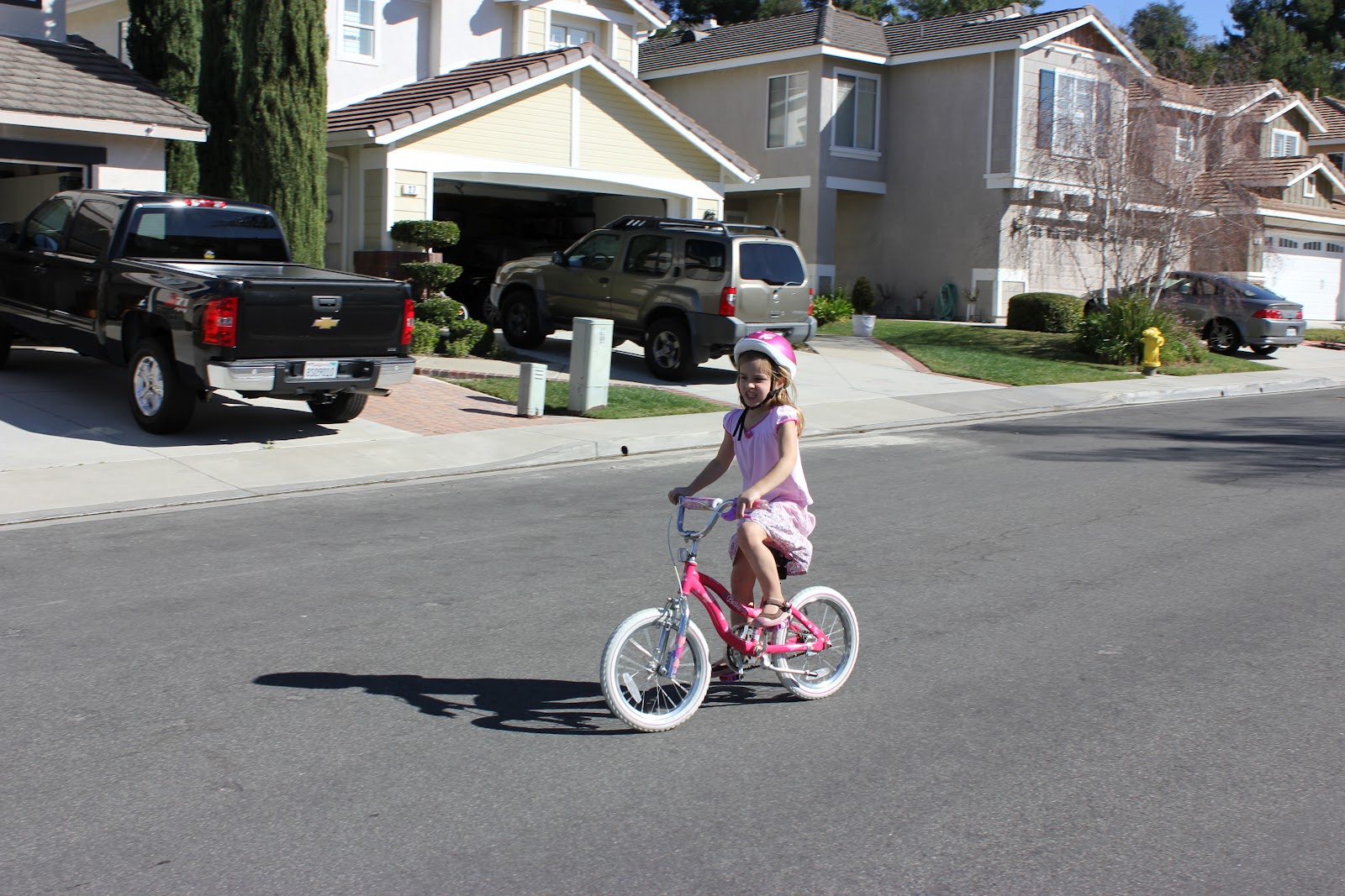 THE BRUSCHKE FAMILY: Bailey's Riding a Two Wheeler