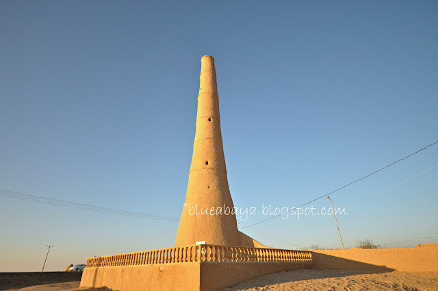 Raghbah And The Rolling Sand Dunes - Blue Abaya