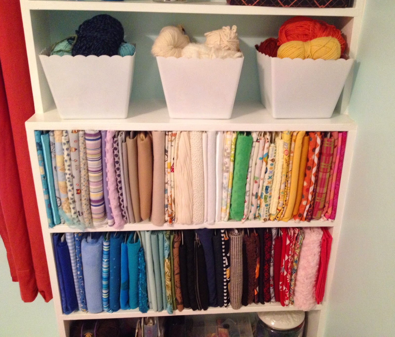 Mess of the Day: DIY fabric bolts and Dollar Tree yarn bins