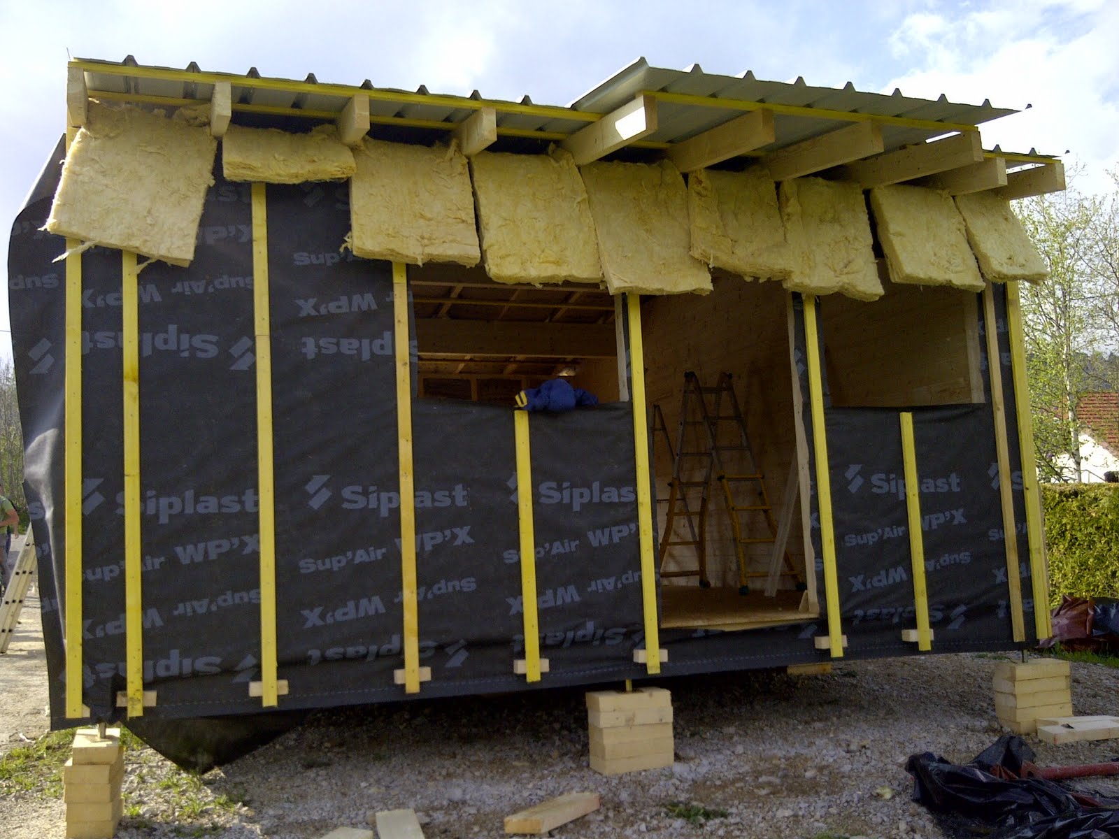 Wood Frame House: Isolation phase 2: Outside isolation and anti rodent ...