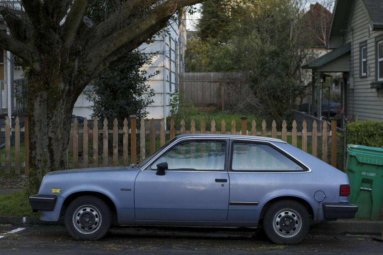 OLD PARKED CARS.: 1984 Pontiac 1000.