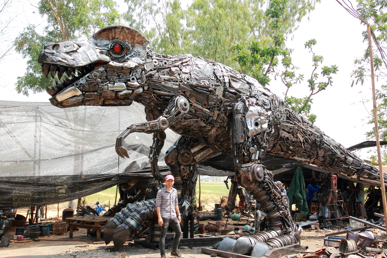 THE ROCKET T-REX DINOSAUR METAL SCULPTURE