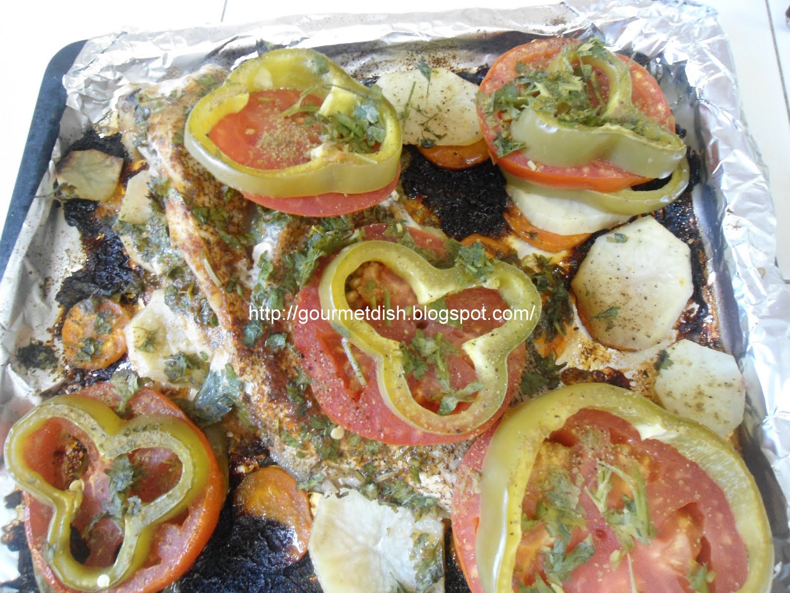 Gourmet Dish: Roast Hamour Fish with Roast Vegetables in the Oven