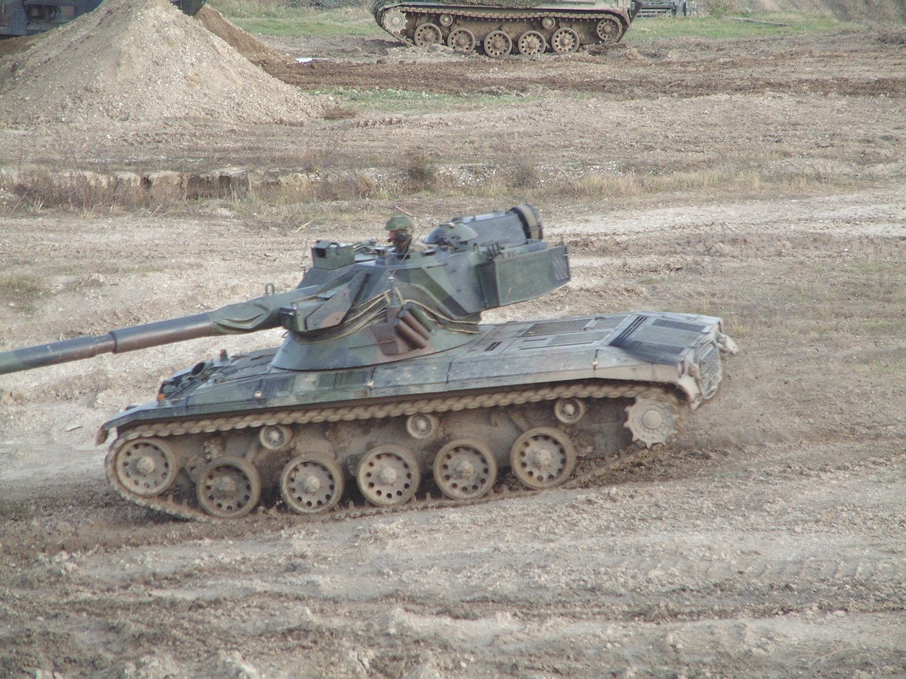 SNAFU!: SK-105 Light Tank. Dinosaur still in production...