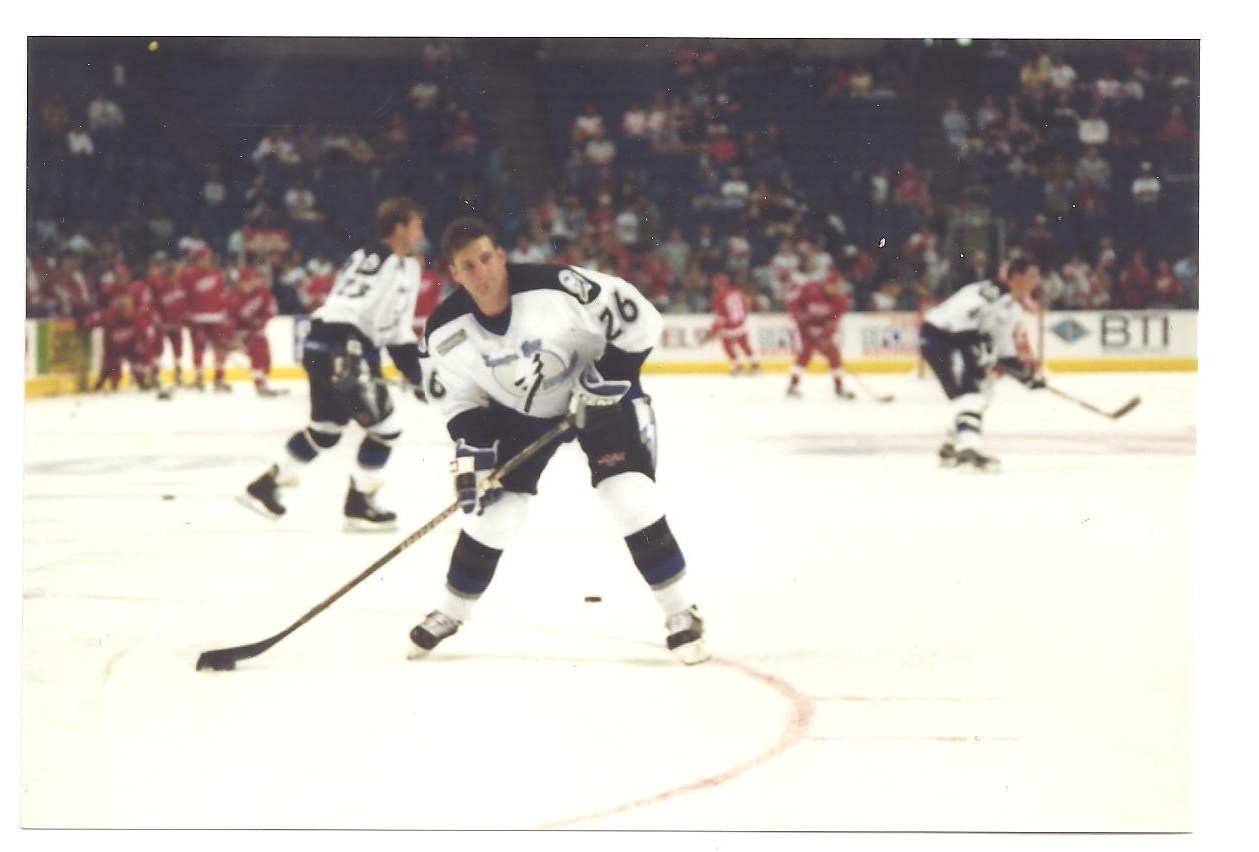 The Hopeful Chase: Gordie Howe in a Lightning Uniform and Other Photos