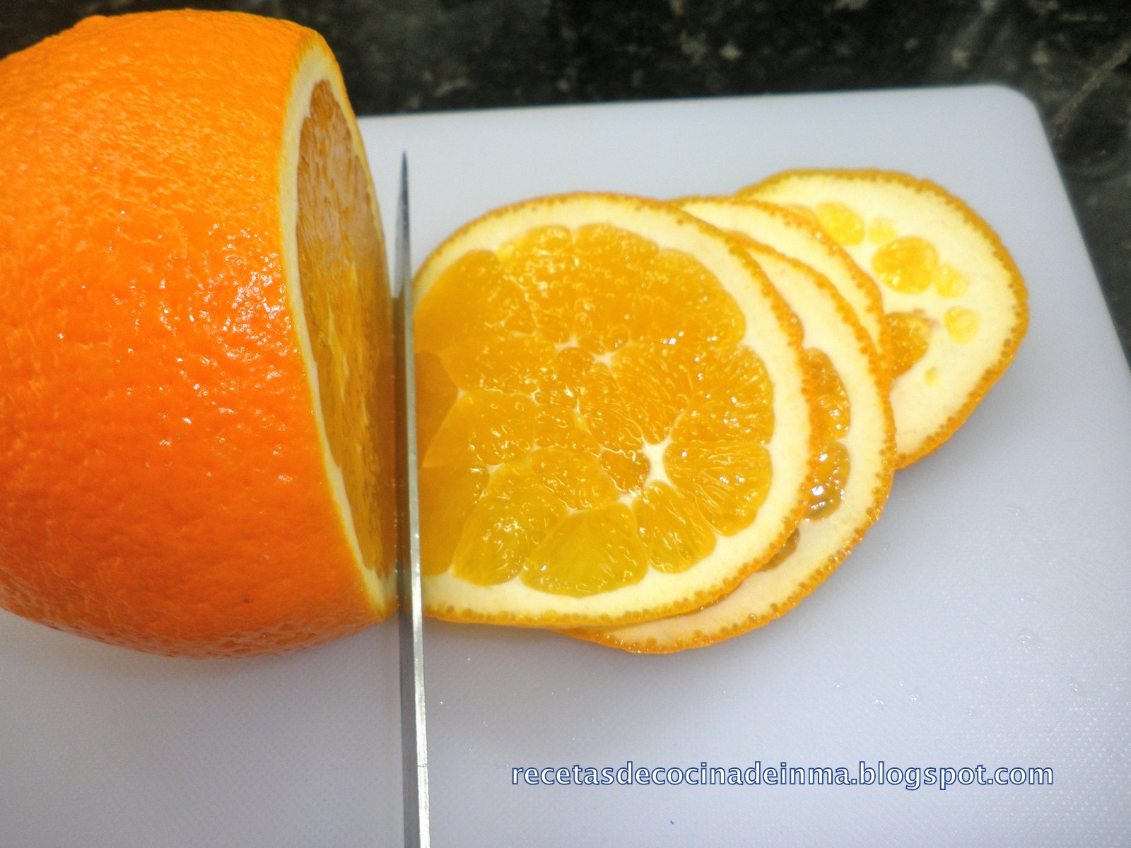 Recetas de cocina paso a paso de Inma Martos: NARANJA CONFITADA EN RODAJAS