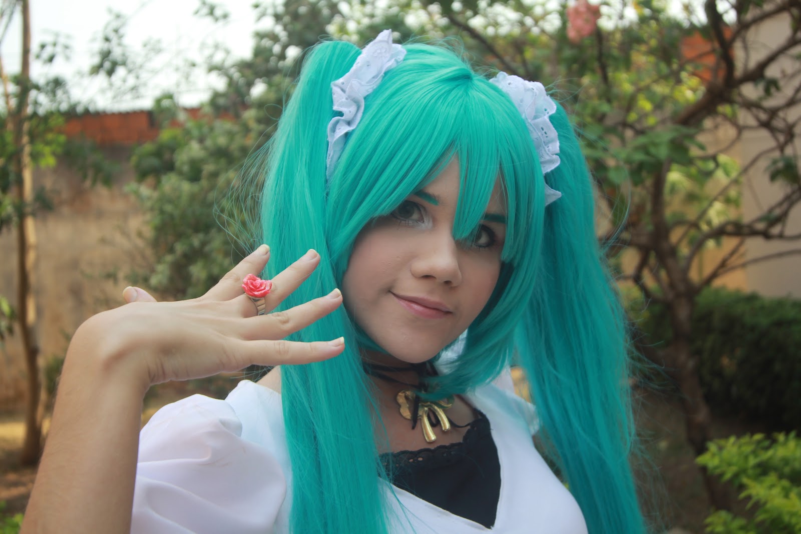 Sakura Amai Cosplayer: Ensaio Cosplay: Miku Hatsune versão World is mine.