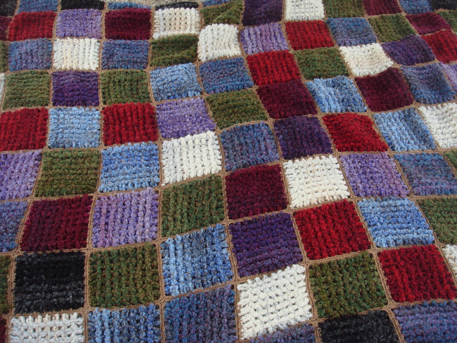 Le coccole di Maria Gio: Coperta a quadri colorati