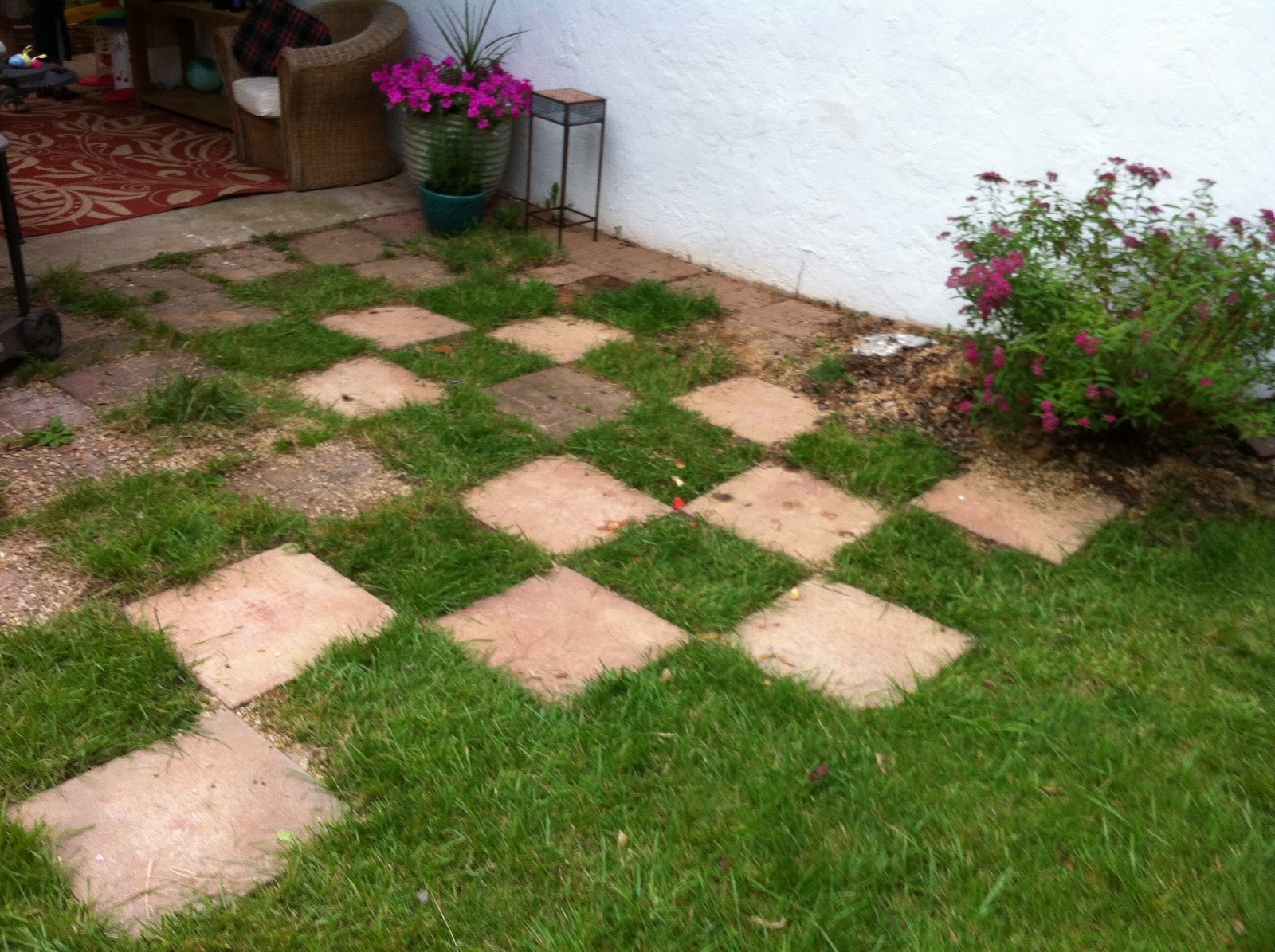 Impatient DIYer: Old ragged pavers to checkerboard yard (spring 2012)