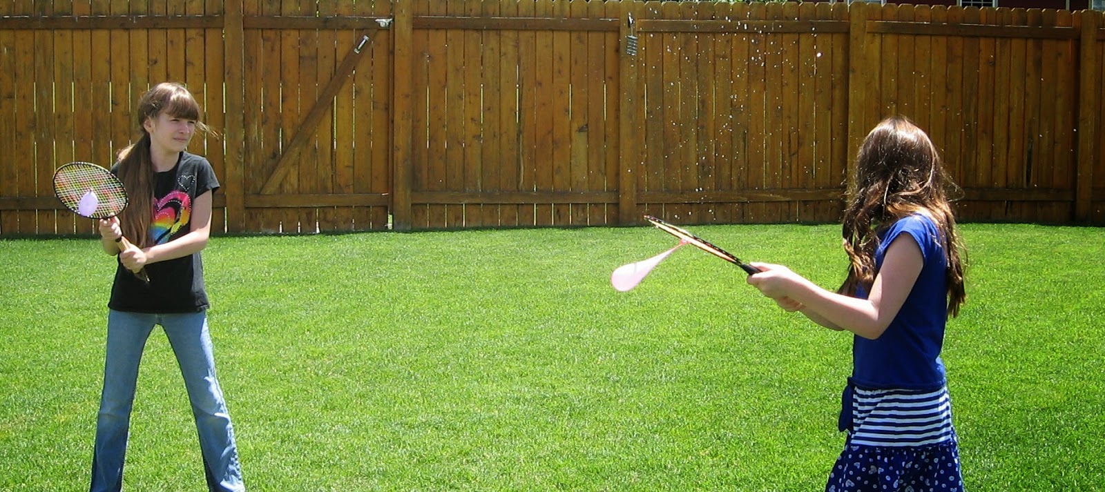 Almost Unschoolers: Summer Fun 2014 - Water Balloon Paddle Ball