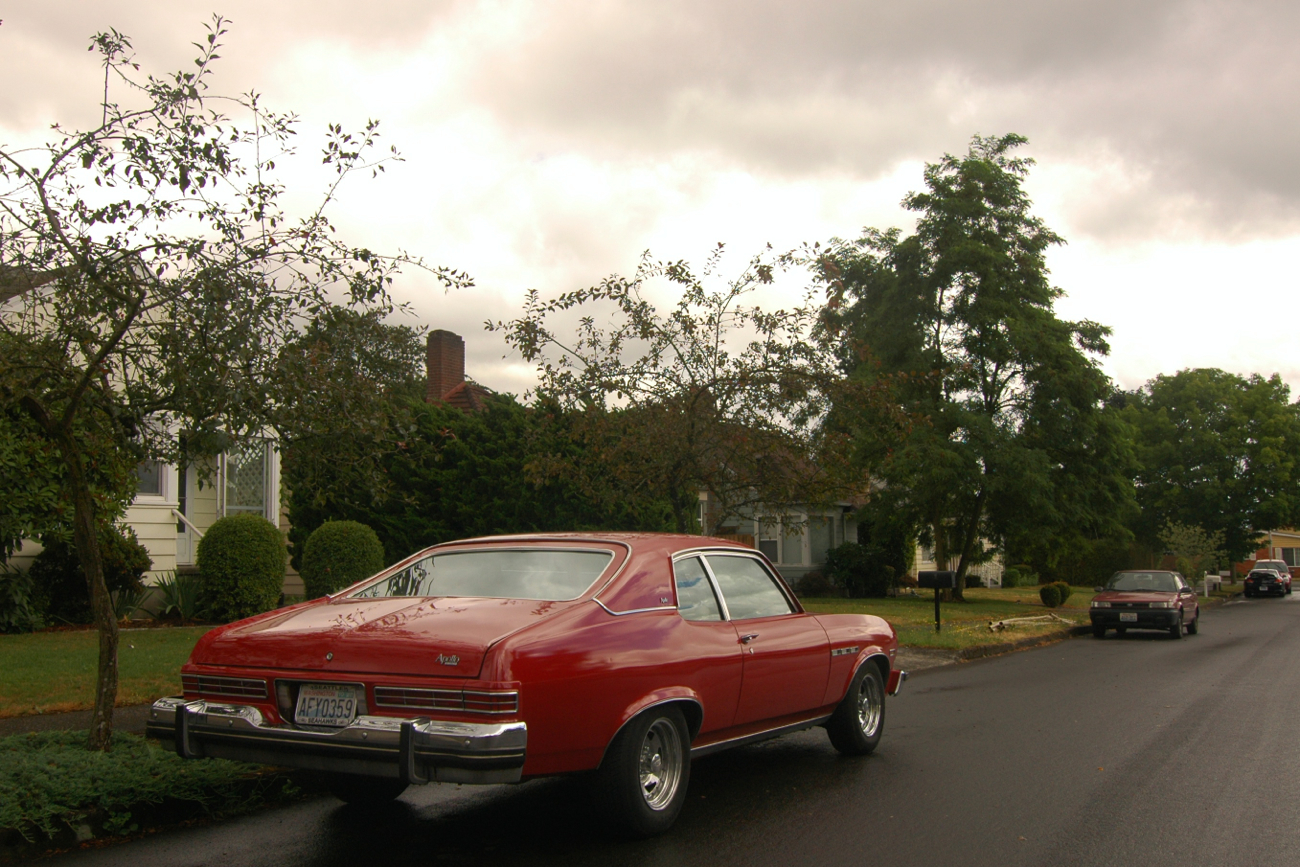 OLD PARKED CARS.: 1974 Buick Apollo Hatchback.