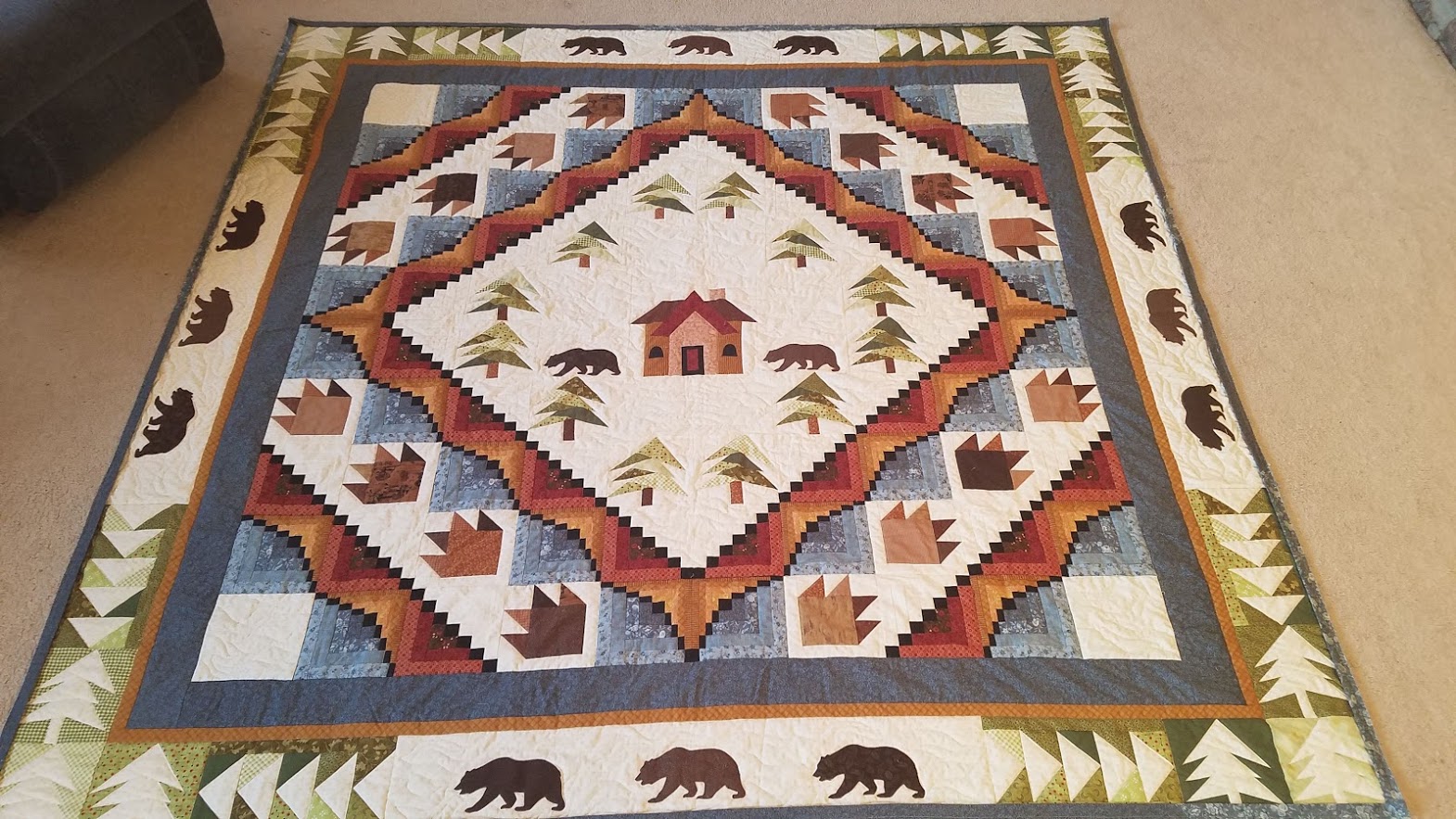 Dreamworthy Quilts: One Bear Paw Log Cabin is done!
