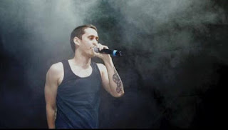 TRAYECTORIA DE CANSERBERO CANTANTE Y COMPOSITOR DE RAP Y MÚSICA URBANA