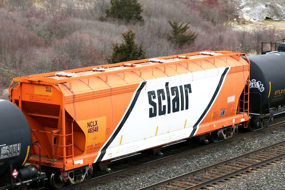 Trackside Treasure: DuPont SCLAIR Covered Hoppers