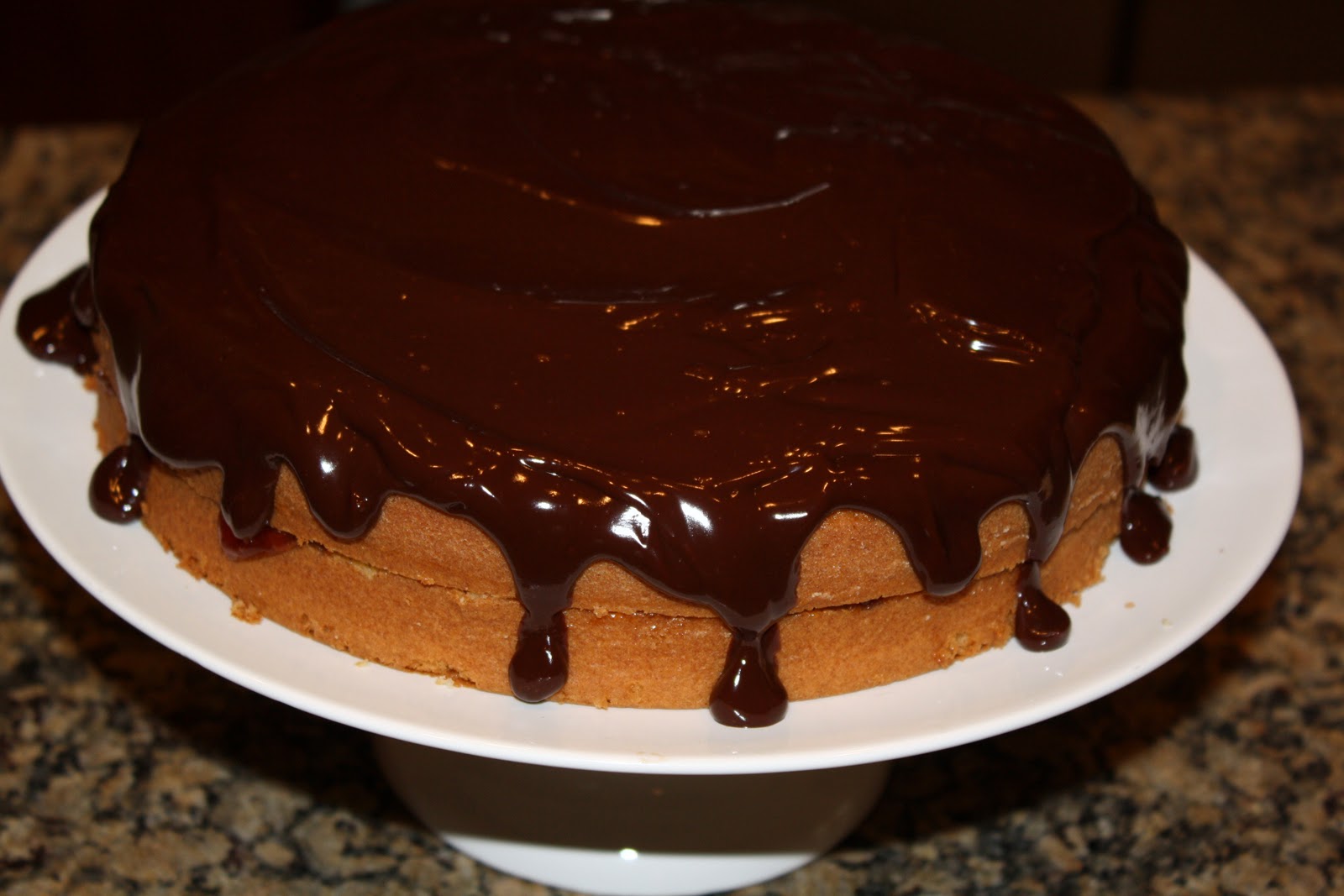 sunday sweets: jam-filled cake with chocolate glaze
