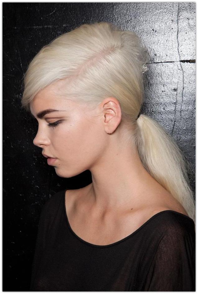 Deep side parted hair