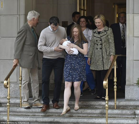 Photos: Chelsea Clinton smiles while leaving the hospital with her ...