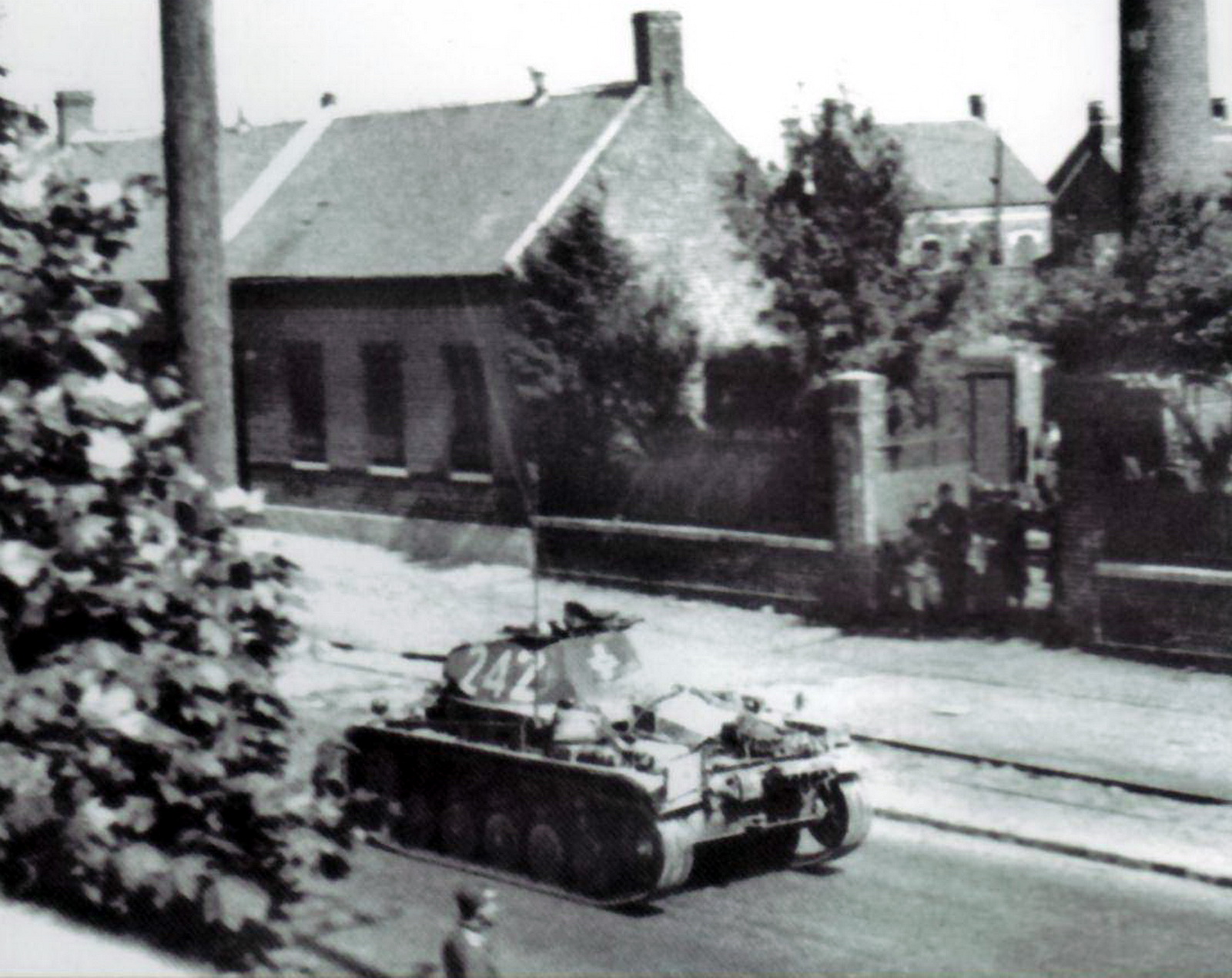 Panzermänner: Panzer II of 7. Panzer-Division Strode in a French Street