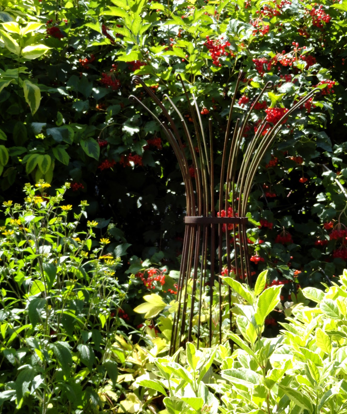 danger garden: A revisit: to a very densely planted, beautiful, garden...