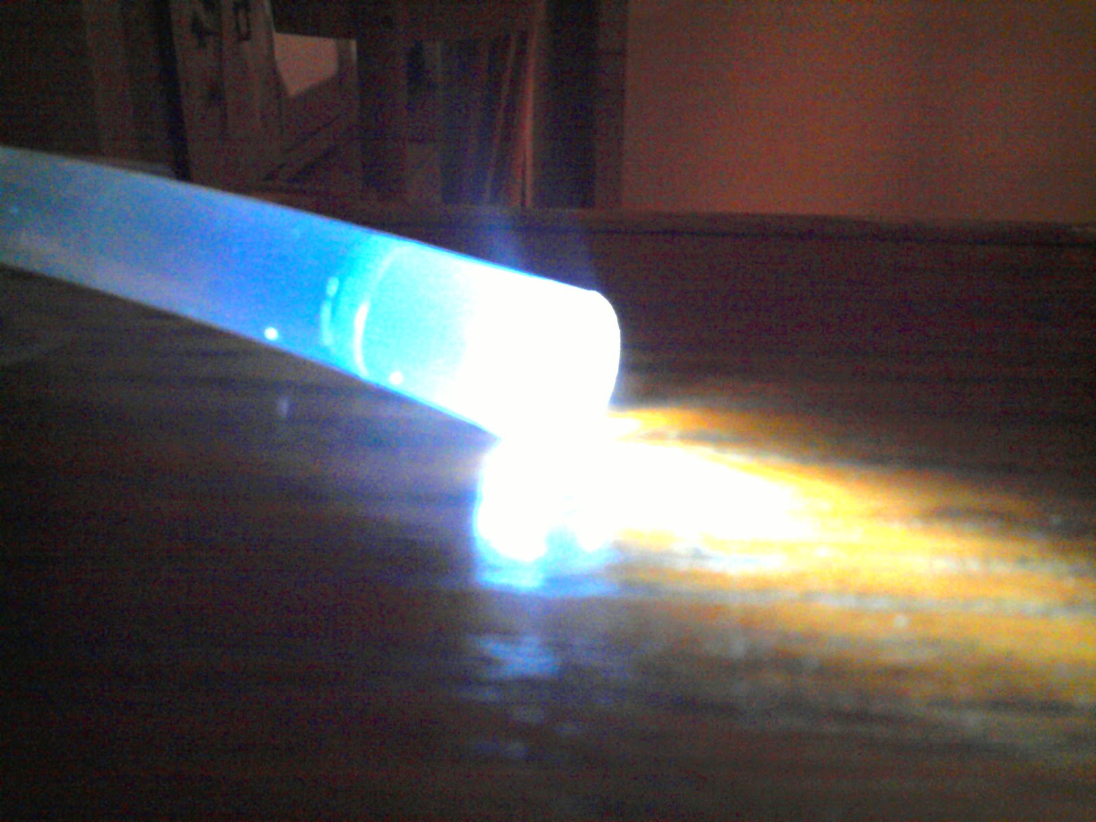 (+ 1 1): Transmitting light, via liquid, down a plastic tube