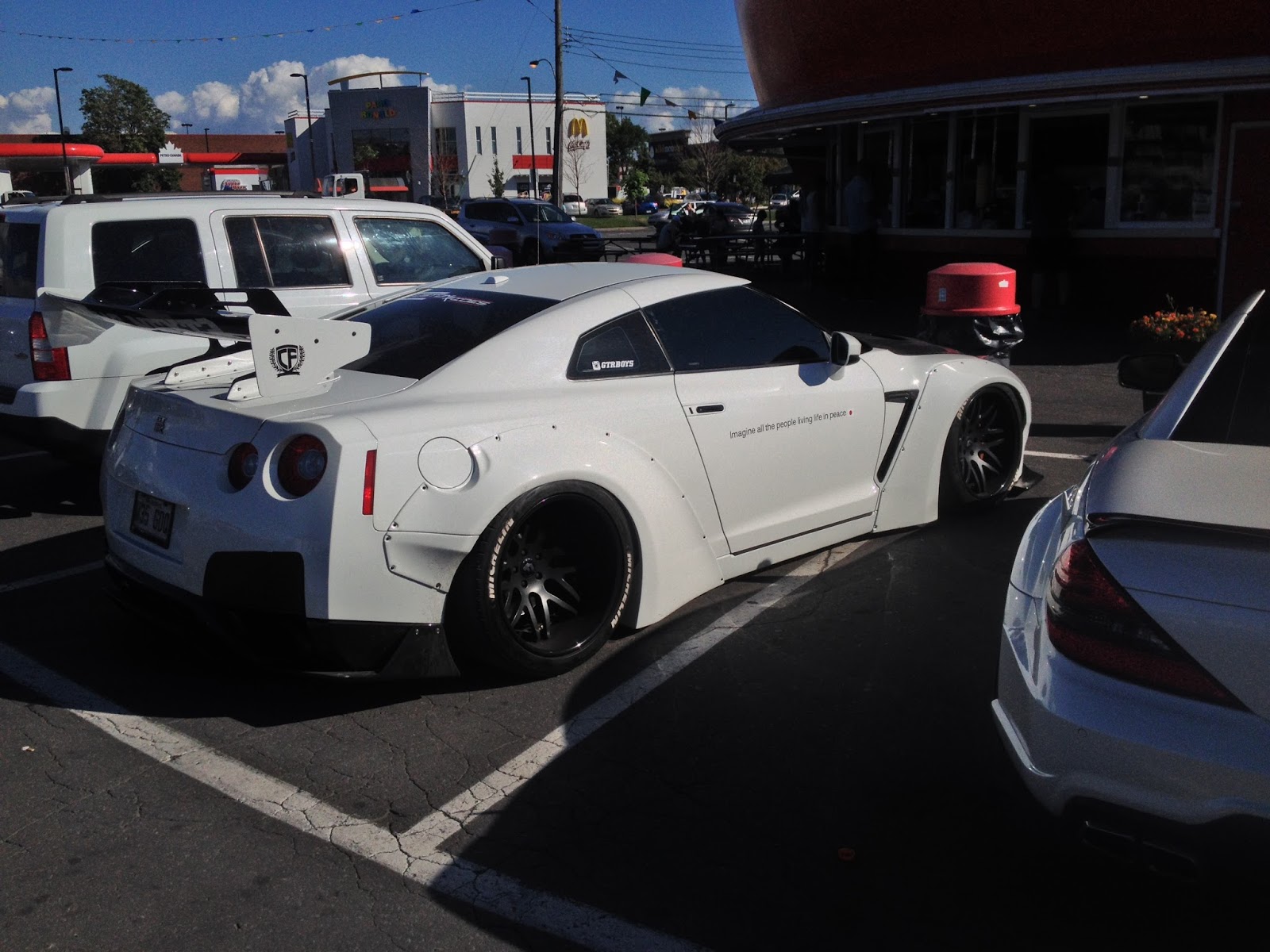 700 HP Wide Body Nissan GTR Slammed on Air Ride Suspension