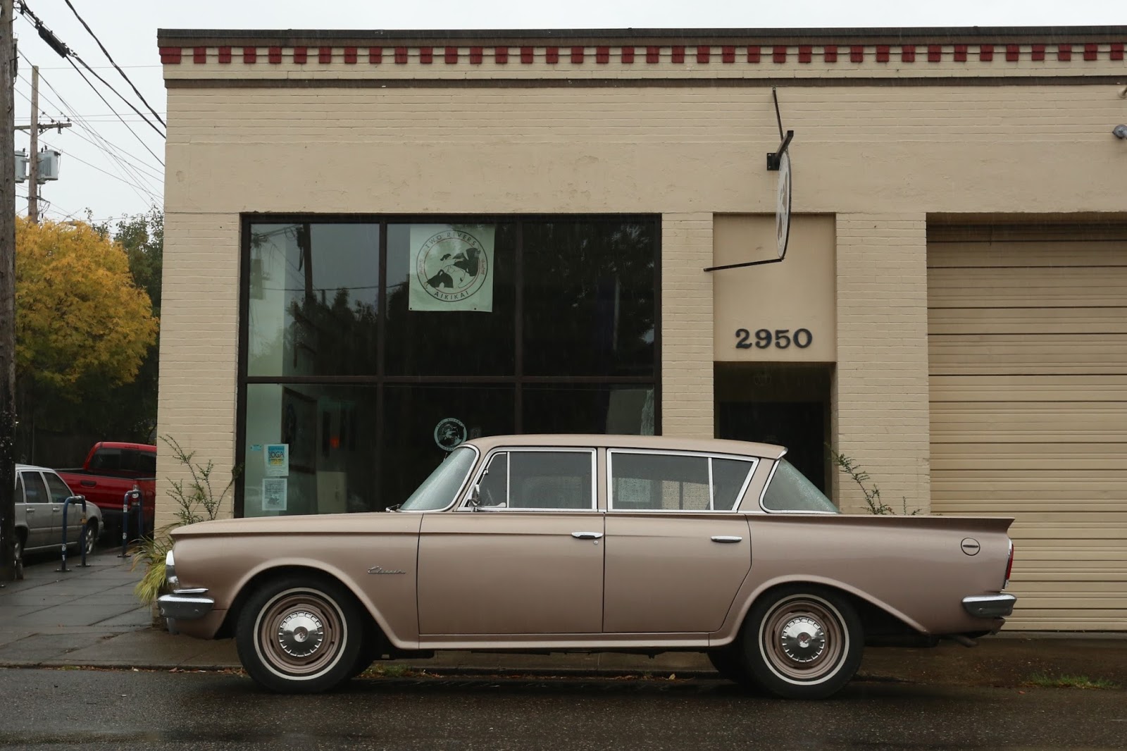OLD PARKED CARS.: 1961 Rambler Classic Deluxe.