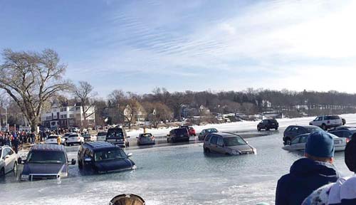Cars Sinking Into Lake As Ice Melts