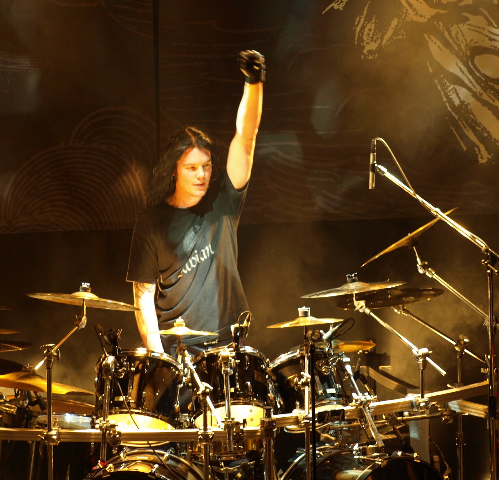 Man with long hair: Daniel Erlandsson (Arch Enemy)