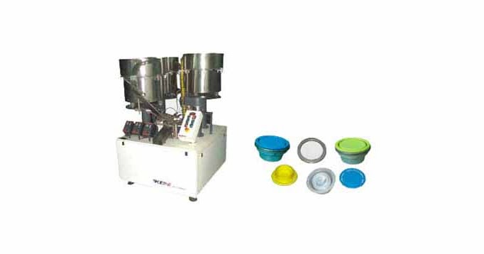 Kenn Automation: Spout Cap Assembly Machines - Kenn Automation