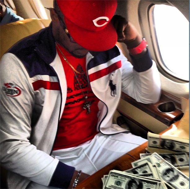 THE GIST: Psquare's Manager, Jude Okoye Flaunts $70K Cash For Camera