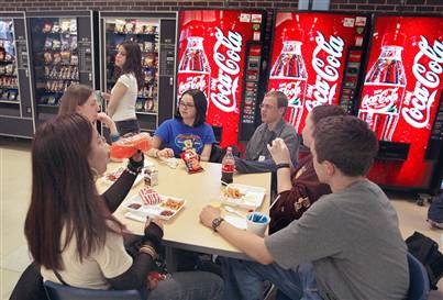 The Form of Money: Schools and Coca-Cola