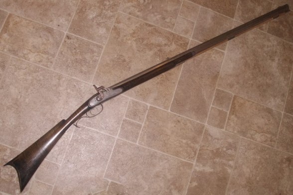 Joe Schell flintlocks: 36 cal half stock rifle.