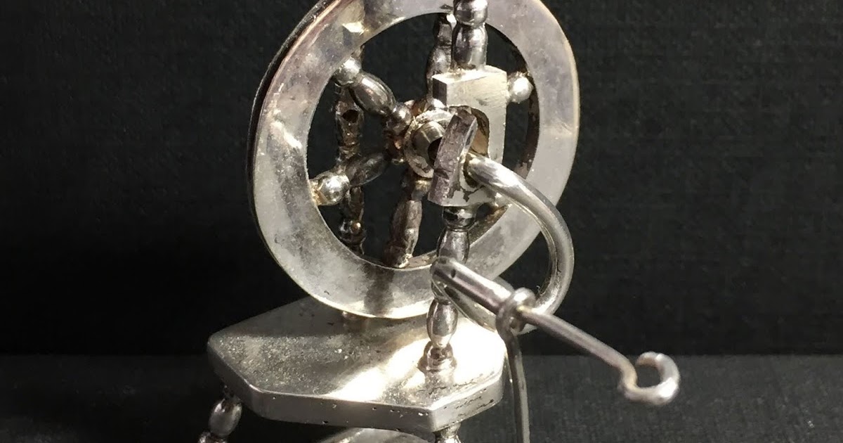 Silver spinning wheel