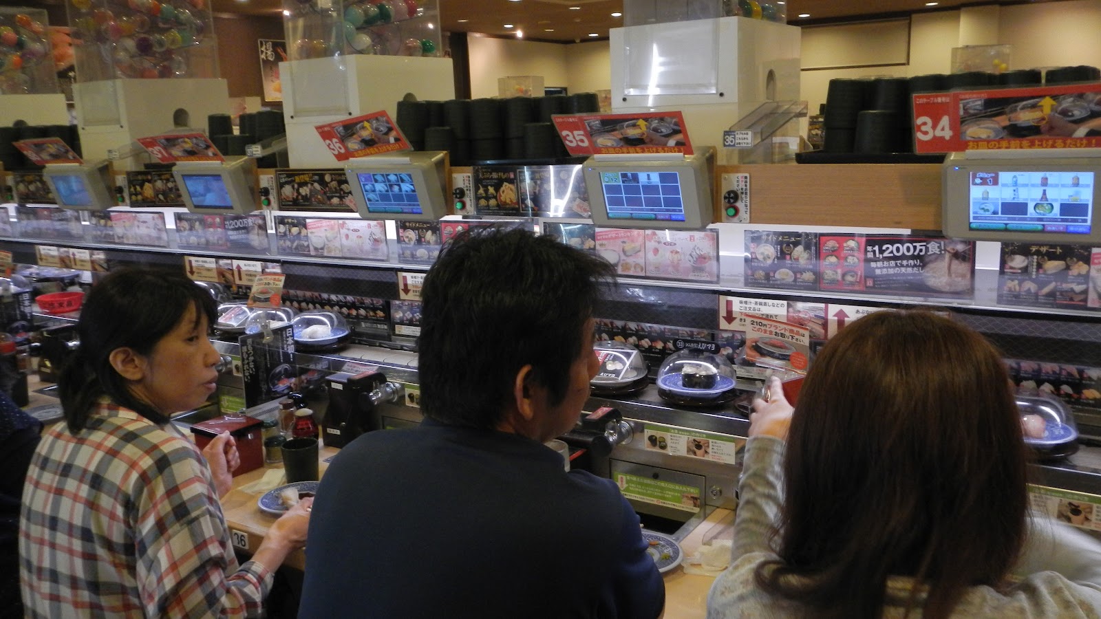 High tech rotating sushi: Sushi speed trains are in, the conveyor belt ...