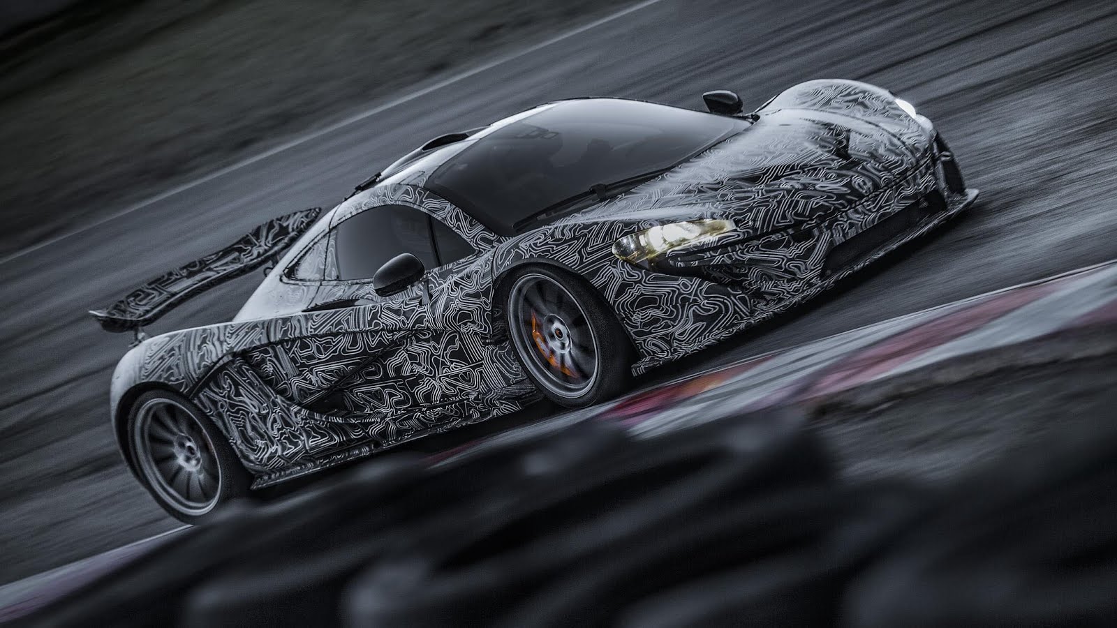 Watch the McLaren P1 Being Driven on a Race Track and Spitting Flames ...