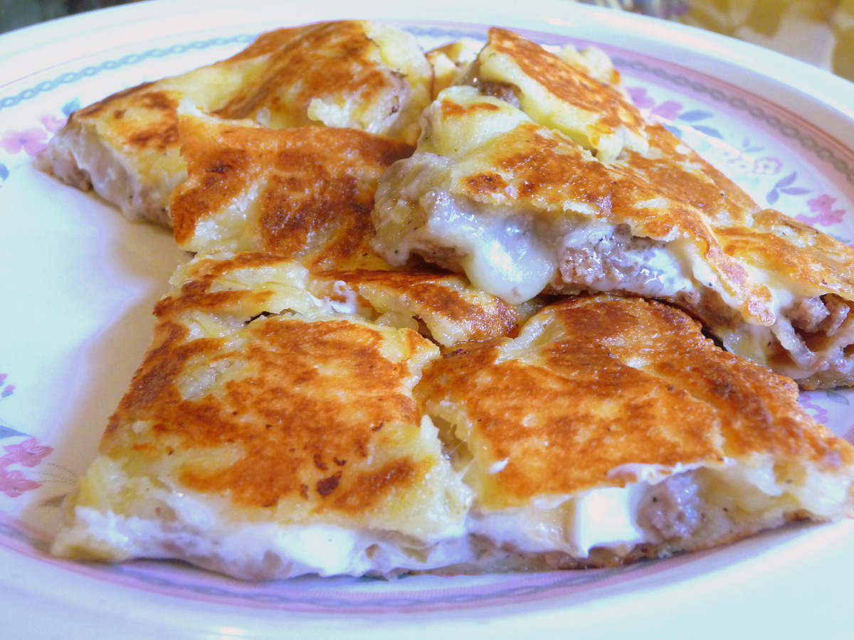 MOLTEN CHEESE BEEF OR CHICKEN QUESADILLAS