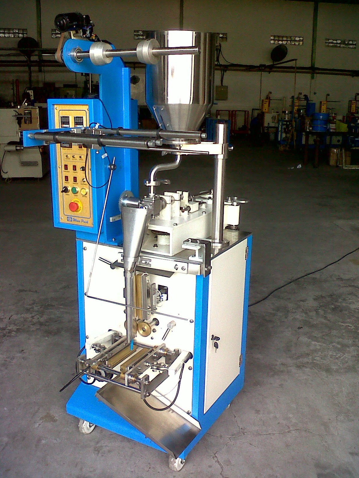 MESIN PENGEMAS OTOMATIS: Mesin Pengemas Produk CAIR dan Bumbu Masak Instant