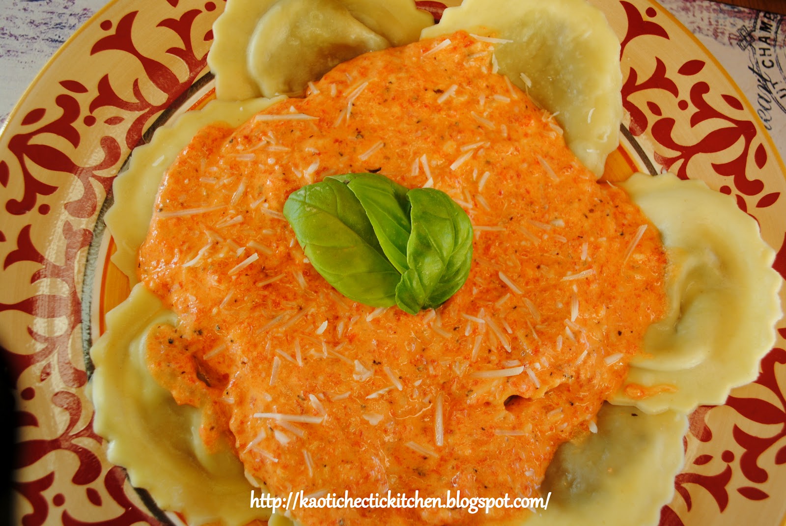 mushroom ravioli with a roasted red pepper sauce