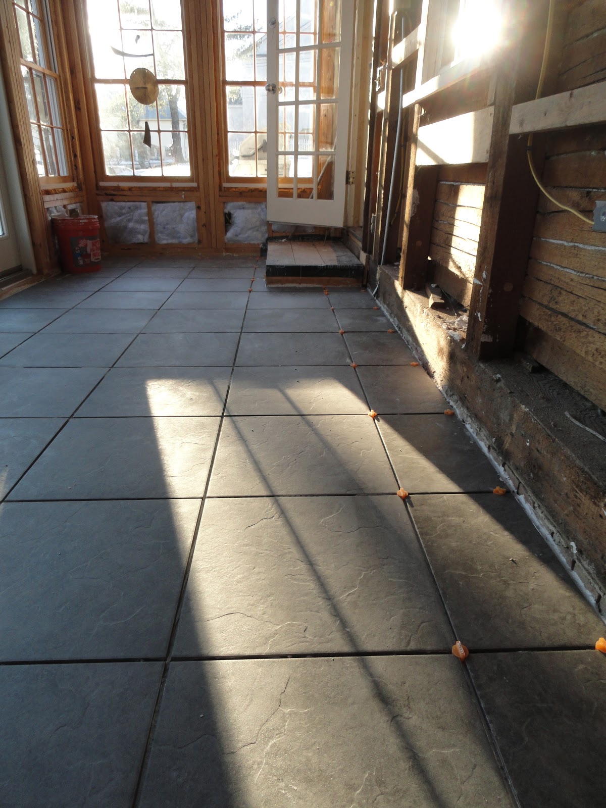 Porch Revival: Perimeter tiles installed