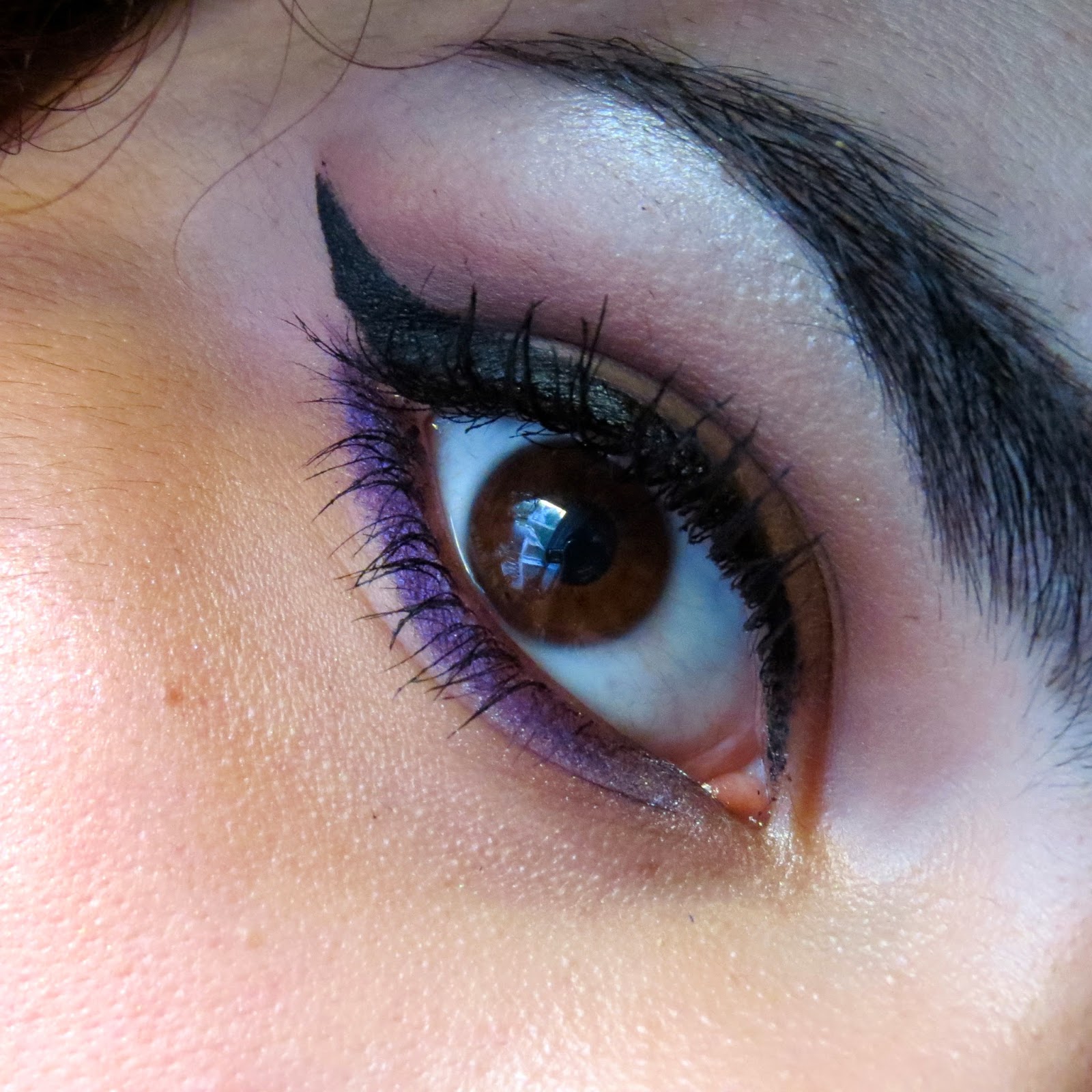 Kiss And Make Up Make Up Look Winged Liner And Purple Accent