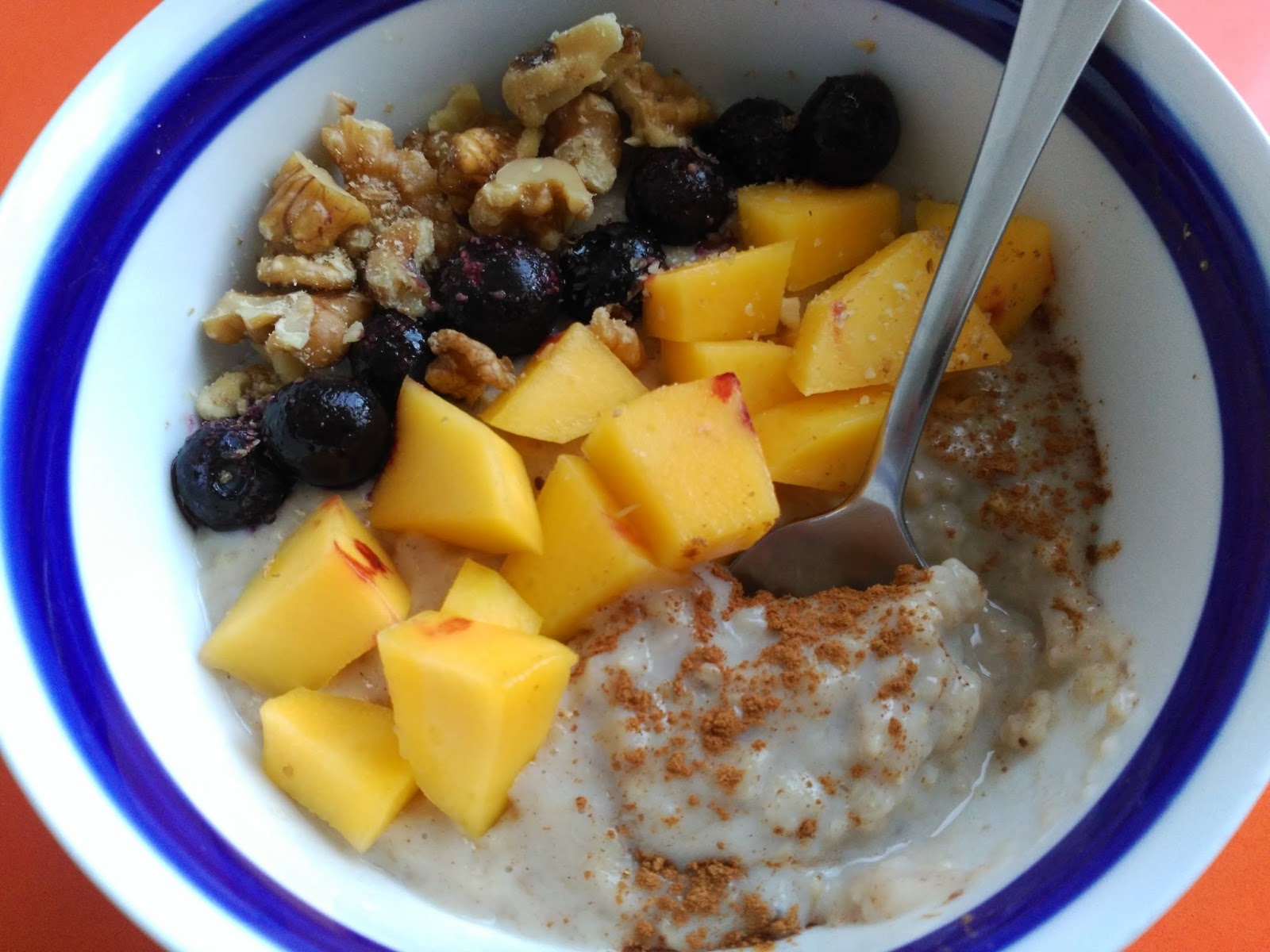 Archivando Recetas: Porridge de canela con mango, arándanos y nueces ...