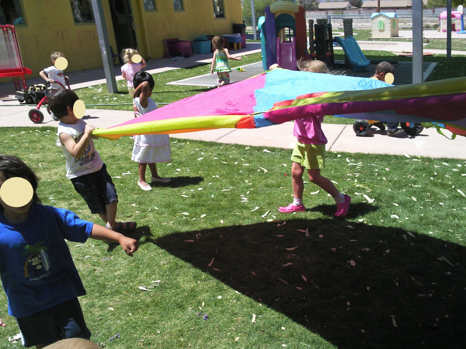 Play-Based Classroom: Exploring wind with a parachute