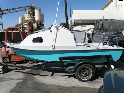 Beach Fleas.: hobie power skiff.