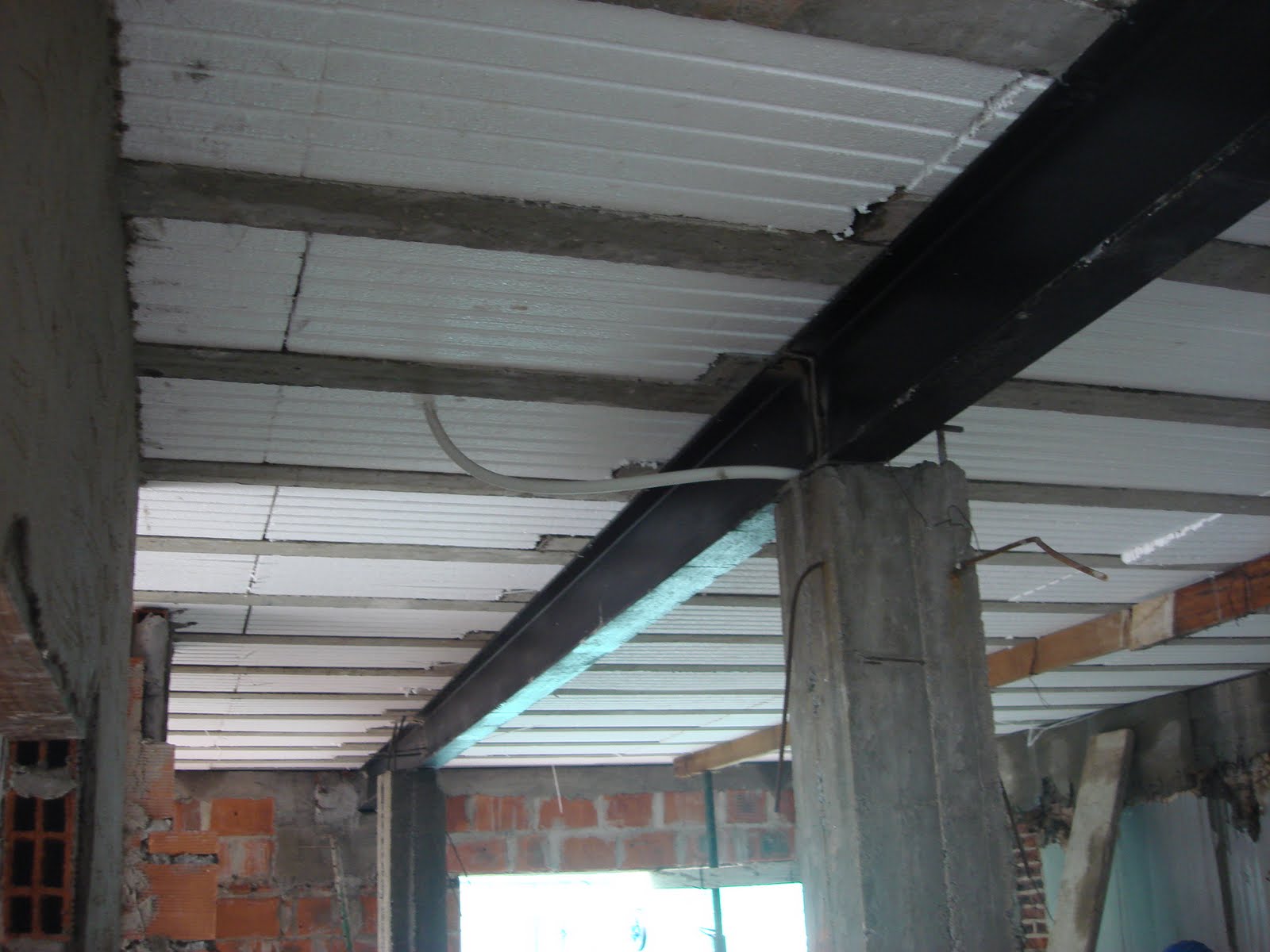 Refacción en Devoto: Llenado capa de compresión.